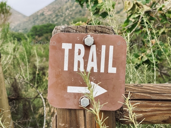 Words in the wild a trail sign with arrow pointing to the proper way to ...