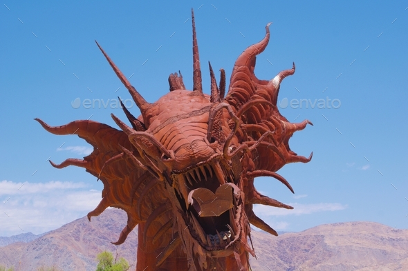 350' steel serpent weaving in & out of the desert floor welded together ...