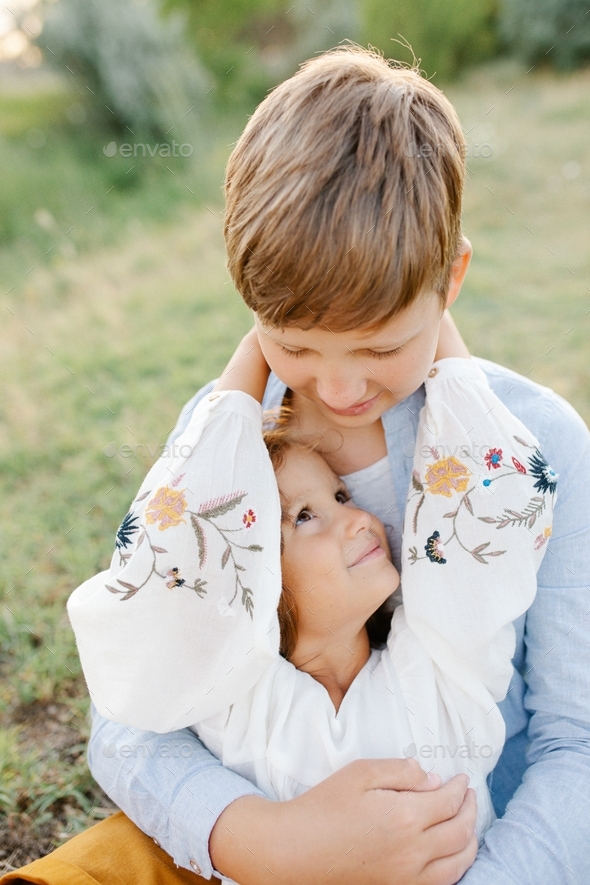 Brother and sister hugs. Family love Stock Photo by sonyashna | PhotoDune