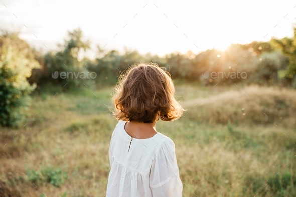 Portrait of child girl. People from behind Stock Photo by sonyashna