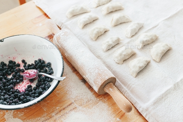 Process of making sweet varenyky vareniki pierogi with berries ...
