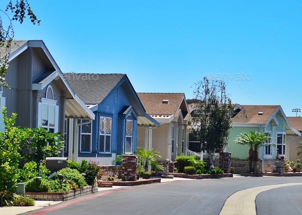 Houses lined up on a quiet suburban street in a neighborhood Stock ...