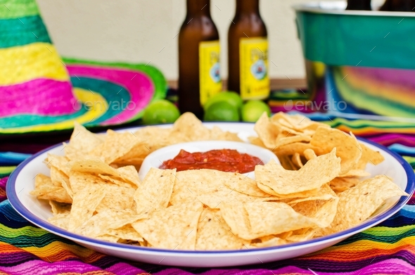 Chips and salsa and Mexican beer to celebrate cinco de Mayo Stock Photo ...