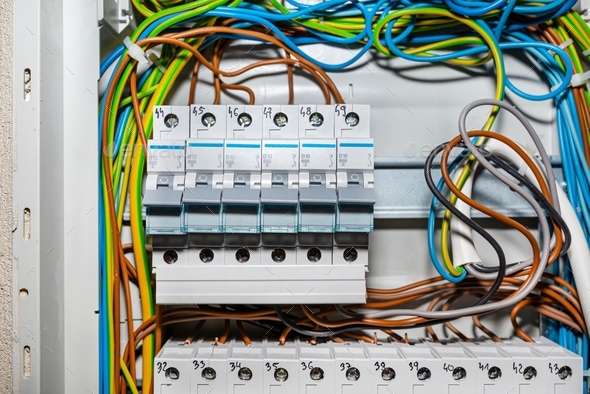 Single-phase fuses in the OFF position, placed in the home fuse box ...