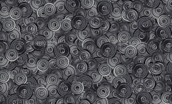 Pattern made from a stack metal weights 1kg and 2kg. Top view, flat lay ...