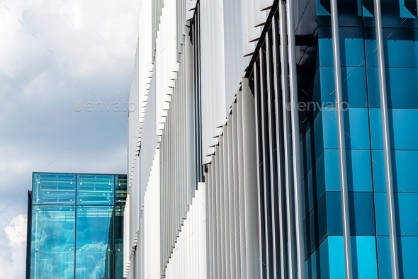 The facade of a modern building with an innovative facade made of ...