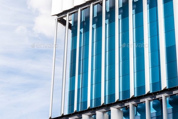 The facade of a modern building with an innovative facade made of ...