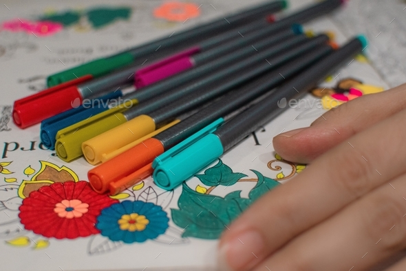 The hand of teenagers while drawing using colorful markers Stock Photo ...