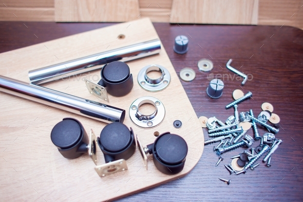 Fasteners for collecting furniture. A set of fasteners for assembling a ...