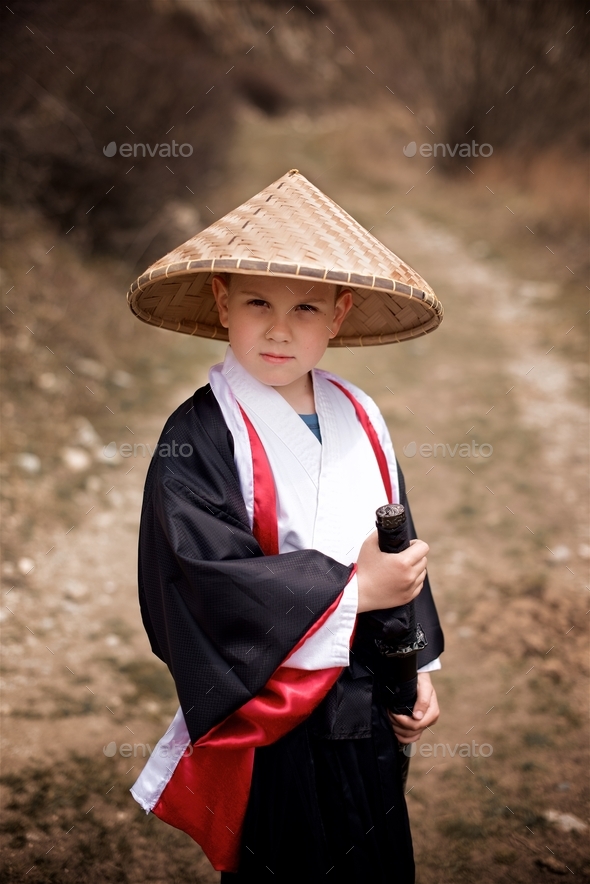 Way of the Samurai Boy dressed as a samurai Stock Photo by Marinabars_photo