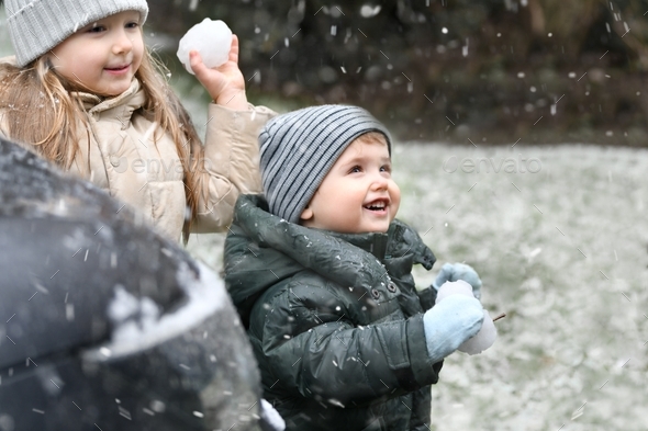 Children playing snowballs Stock Photo by o1559kip | PhotoDune