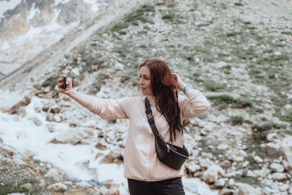 A woman snapping photos Stock Photo by o1559kip | PhotoDune