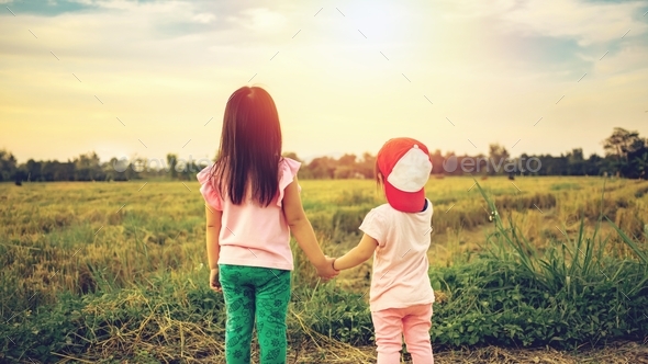 Kids from behind view. Love and bonding in family concept. Stock Photo ...