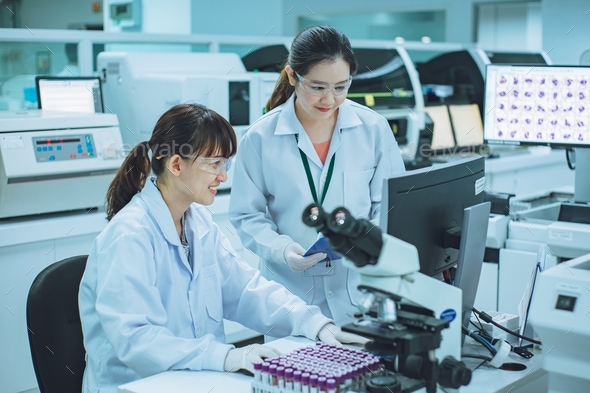 Medical doctor analysis a result of blood samples in research Stock ...