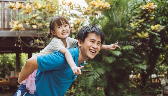 Father and little chid play together in a moment of happy time. Stock ...