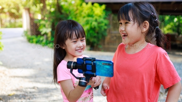 Children as video influencer has fun with online live show for social ...