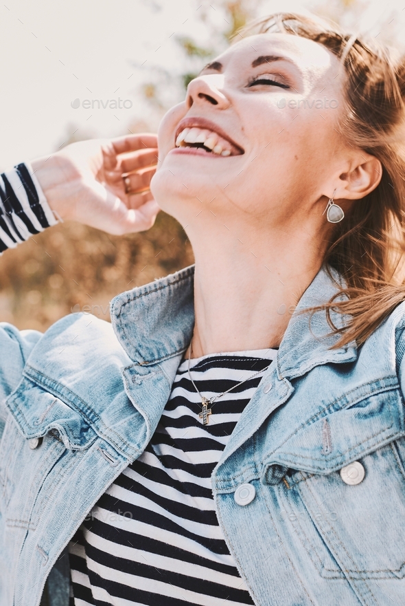 Woman feeling very happy. Joyful. Happiness. Close up portrait of adult ...