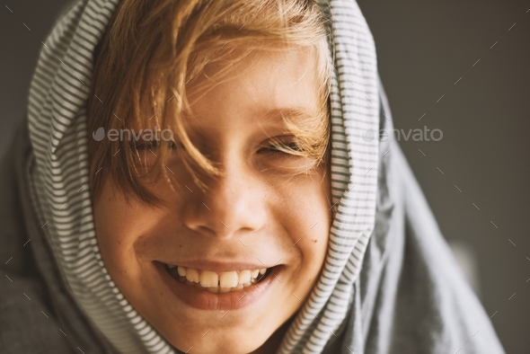 Cute happy 10 years old boy face playing after sleeping Stock Photo by ...