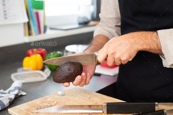Cutting and cooking Stock Photo by stetphotos | PhotoDune