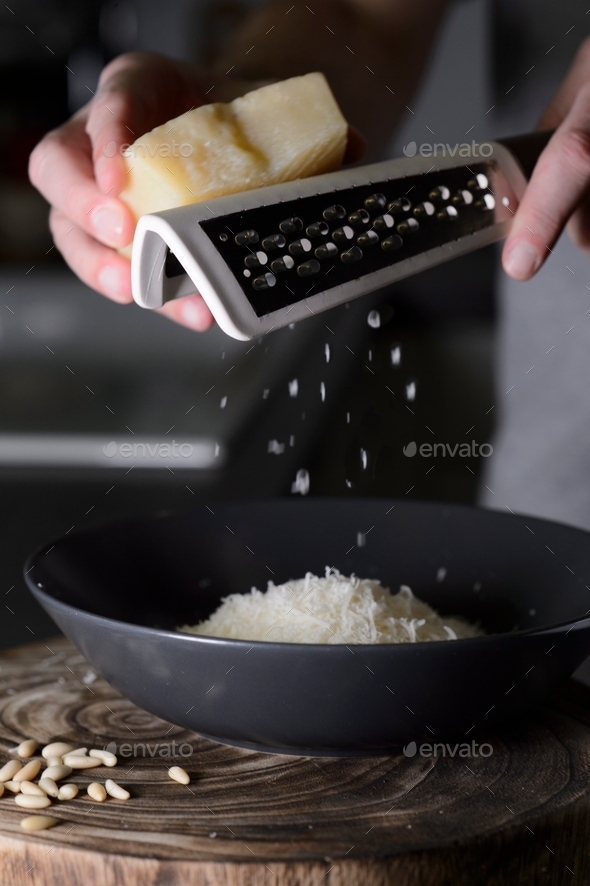 Grating cheese Stock Photo by stetphotos | PhotoDune