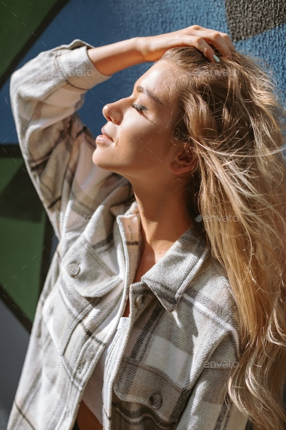 Portrait of beautiful woman with long hair blowing in the wind. Stock ...