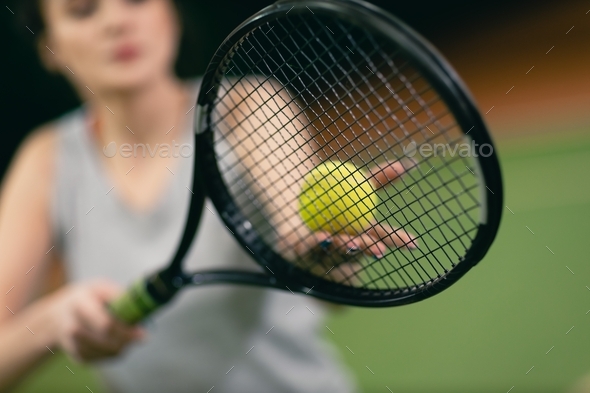 Tennis woman player hold racket and ball at court. Bottom view Stock ...