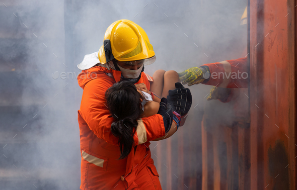 Fire fighting team rescue life saving young girl from fire burn and ...