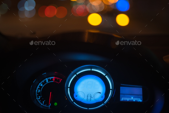 The speedometer of the modern car. Evening night time. Close up view ...
