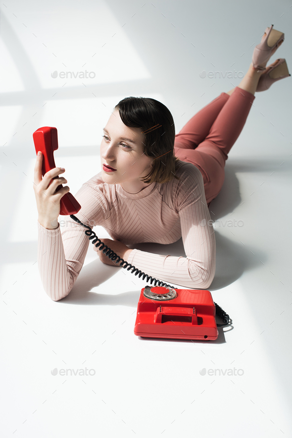 beautiful retro styled girl with vintage rotary telephone Stock Photo ...