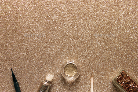 Gold glitter background with makeup Stock Photo by MPPLLC45 | PhotoDune
