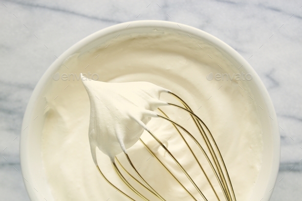 Gold whisk whipping cream Stock Photo by MPPLLC45 | PhotoDune