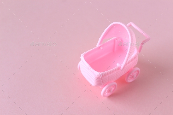 Pink background with pink baby buggy Stock Photo by MPPLLC45 | PhotoDune
