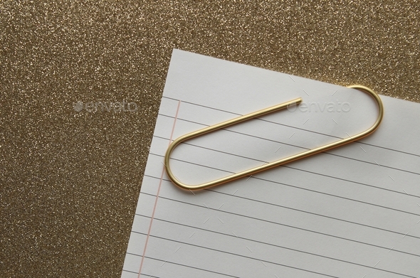 Gold glitter background with note paper and gold paperclip Stock Photo ...