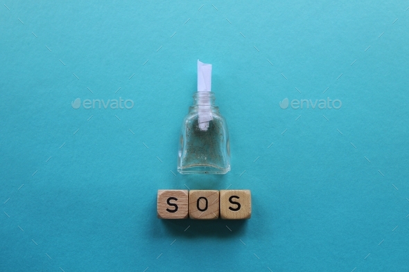 SOS message in a bottle Stock Photo by MPPLLC45 | PhotoDune