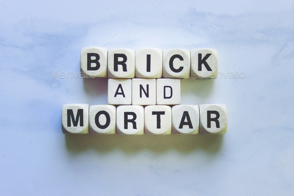 Brick and mortar word dice Stock Photo by MPPLLC45 | PhotoDune