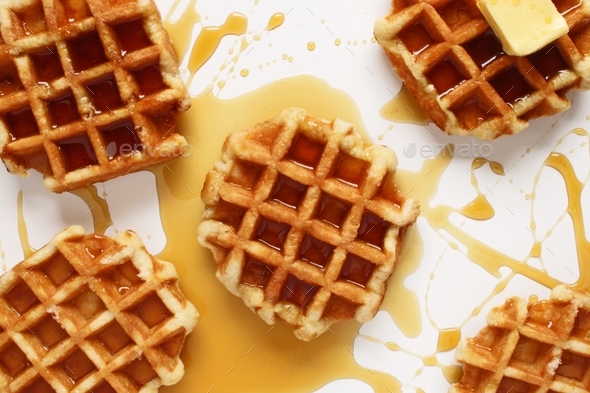 Flat lay Belgian waffles with syrup Stock Photo by MPPLLC45 | PhotoDune