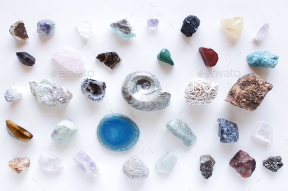 Large rock, mineral and fossil collection flat lay on white background ...