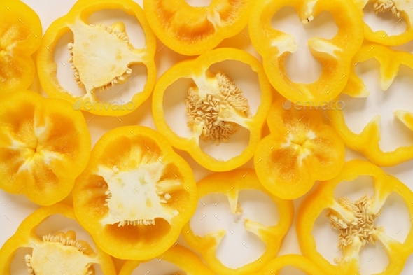 Yellow sliced bell pepper cross section full frame background Stock ...