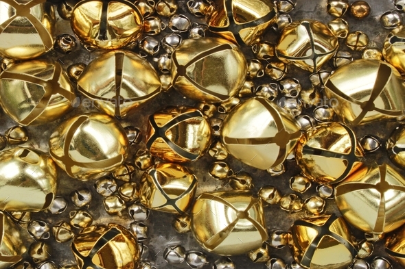 Large group of jingle bells in various sizes and colors background ...