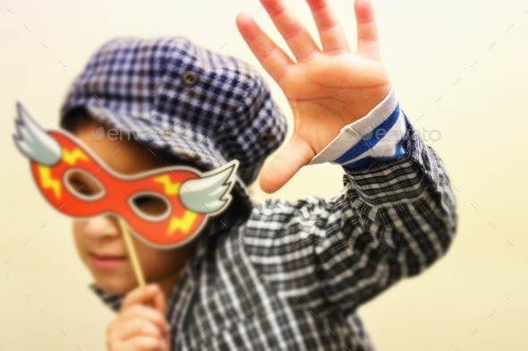 girl Tomboy with Superhero mask high five Stock Photo by andreajoseph2011