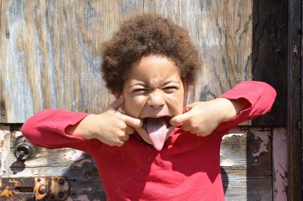 pulling faces with tongue out Stock Photo by andreajoseph2011 | PhotoDune