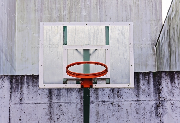 Basketball board with hoop without net in backyard outdoor in grunge ...