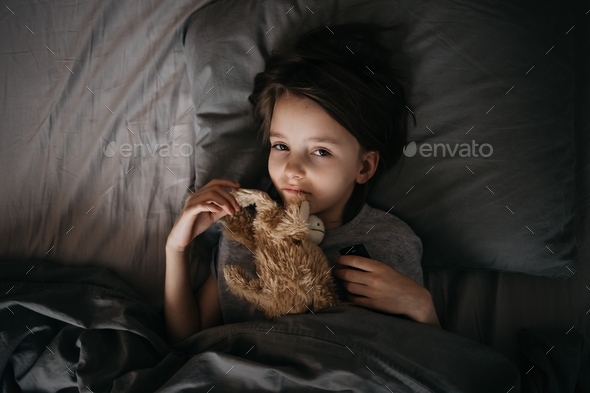 Girl sick at home, mood during quarantine Stock Photo by photability