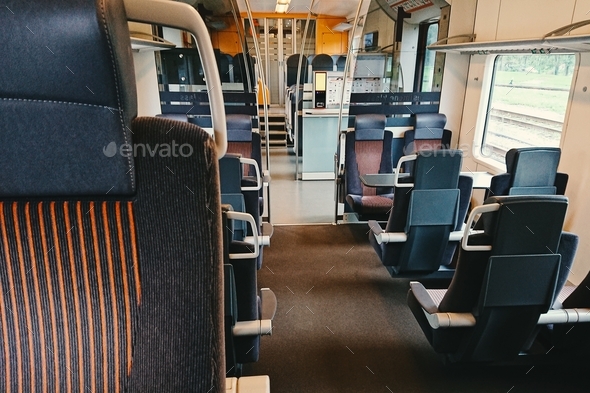 General view of a modern first-class train, seats and tables Stock ...