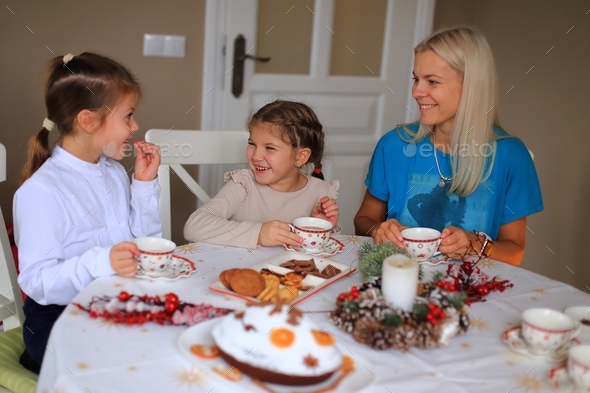 Christmas tea party. Tea ceremony. The family is drinking tea at the ...