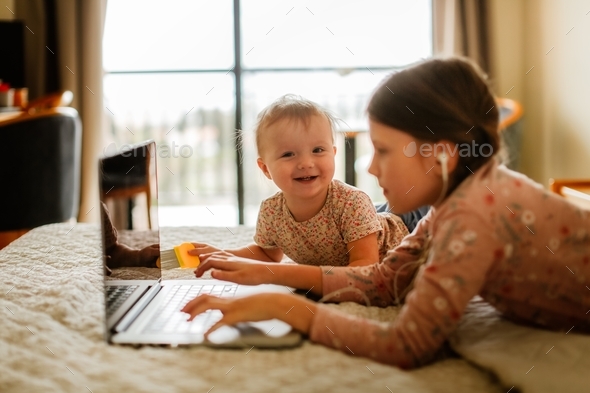 children watch videos together, distance learning and social networking ...