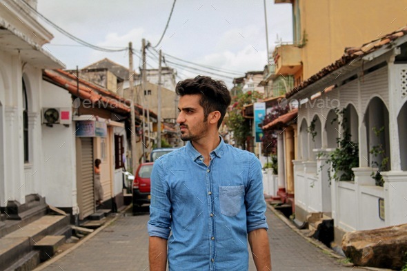 Young man in small town Stock Photo by ashiqkhan | PhotoDune