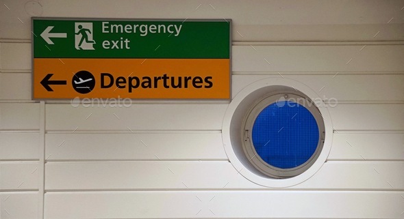 Departures. Traveling. Emergency Exit. Window. Vacations Stock Photo by ...