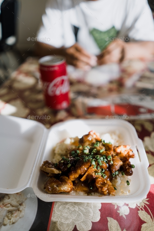 Lunch dinner comfort Hawaiian food plate in togo box container on table ...