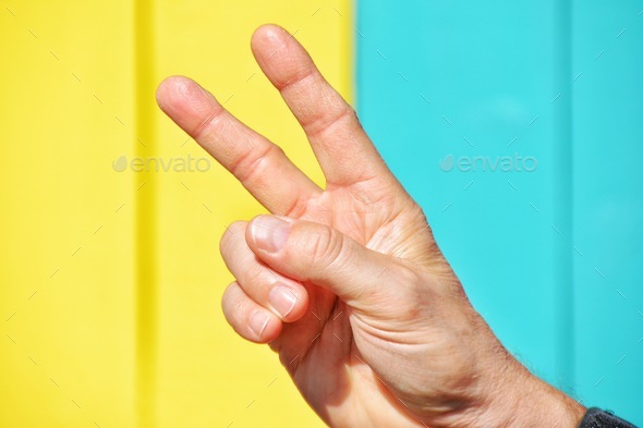 Peace hand sign Stock Photo by Threetails05 | PhotoDune